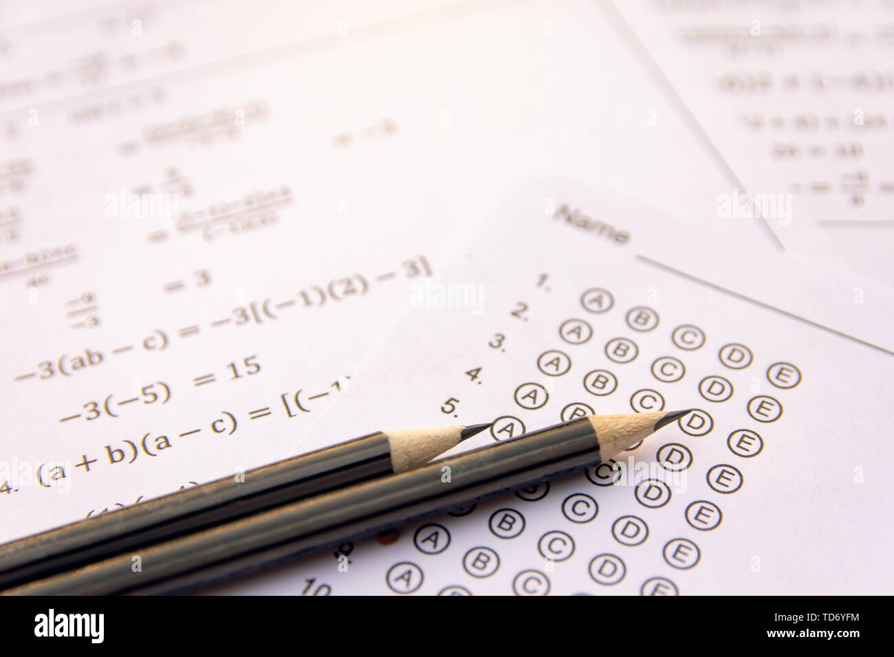 Pencil on answer sheets or Standardized test form with answers bubbled ...