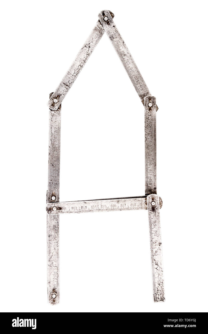 Old iron meter ruler. Old iron folding meter in the shape of letter A ...
