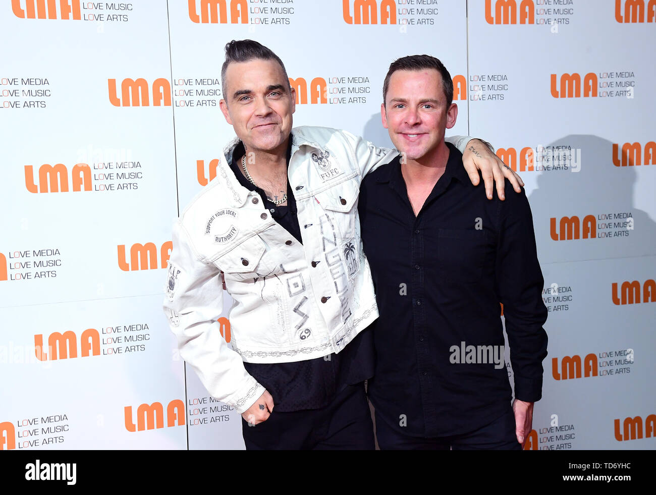 Robbie Williams and Scott Mills at a press conference with X Factor's ...