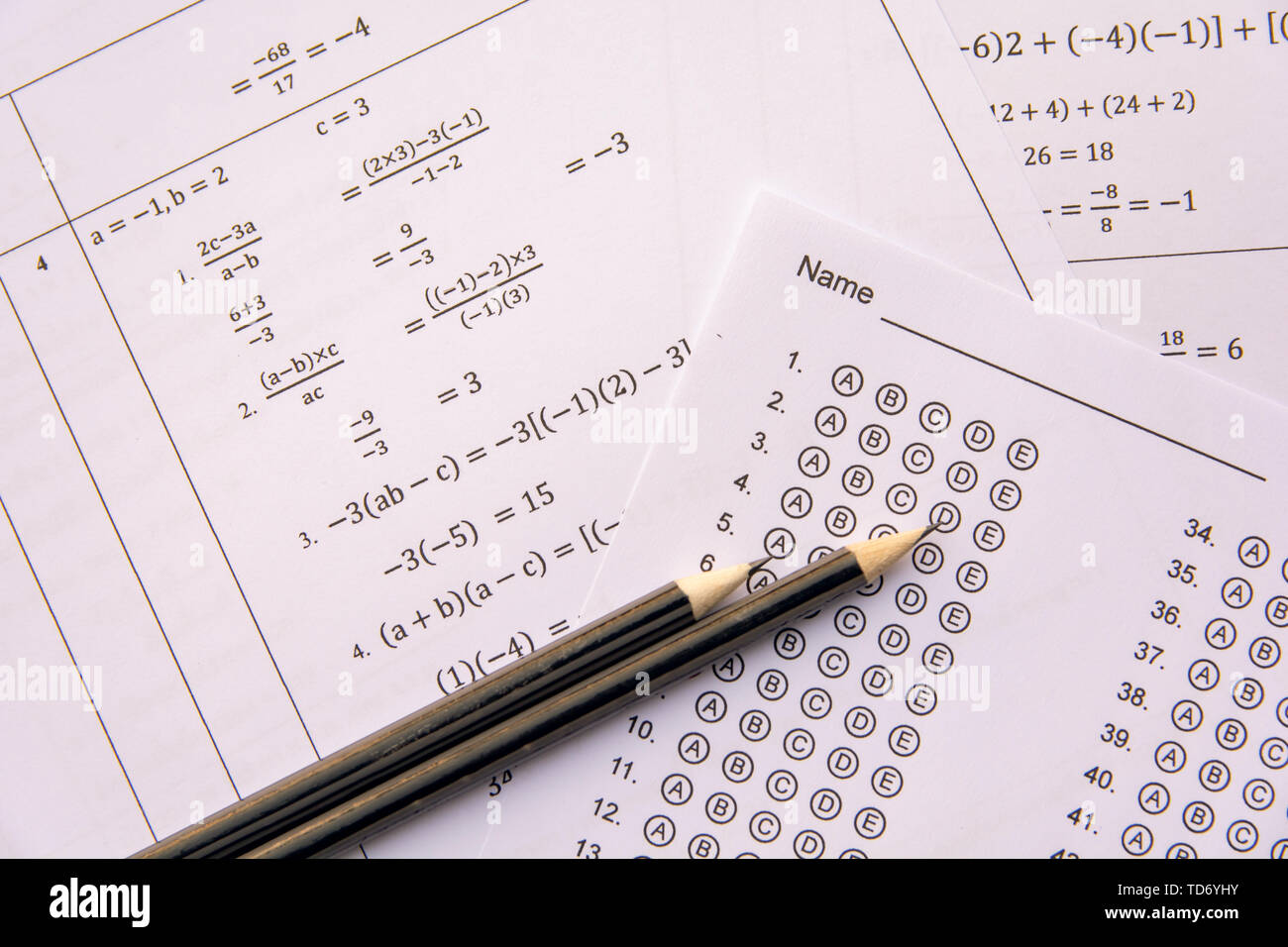 Pencil on answer sheets or Standardized test form with answers bubbled ...
