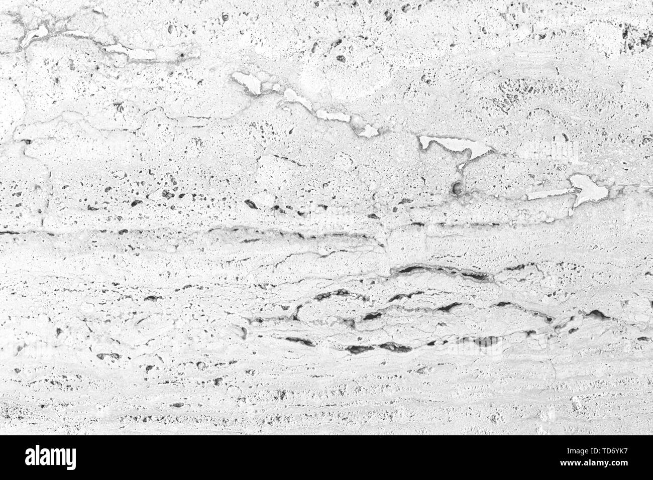 Closeup of light grey and white porous stone textured wall. Neutral ...