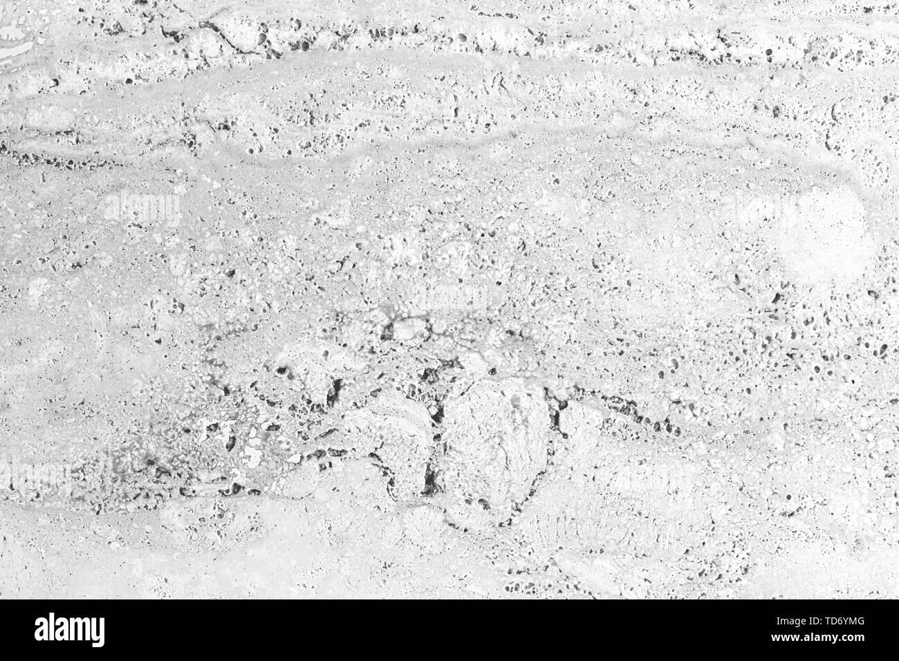 Closeup of light grey and white porous stone textured wall. Neutral ...