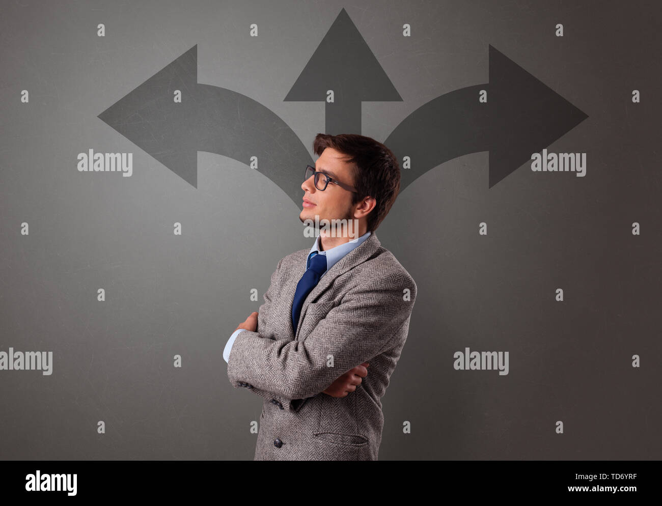Business person choosing between two directions Stock Photo - Alamy