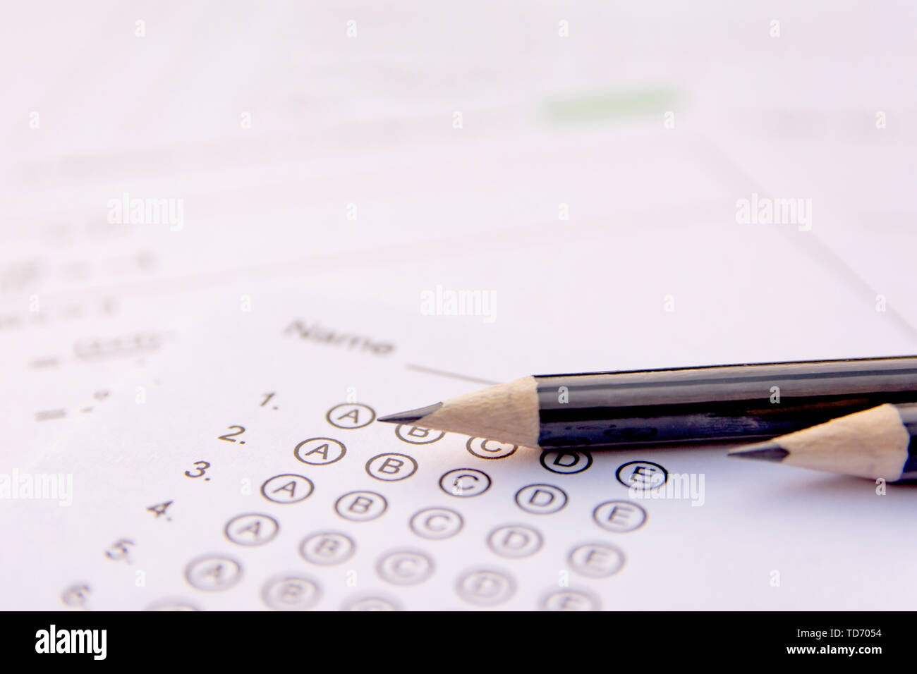 Pencil on answer sheets or Standardized test form with answers bubbled ...