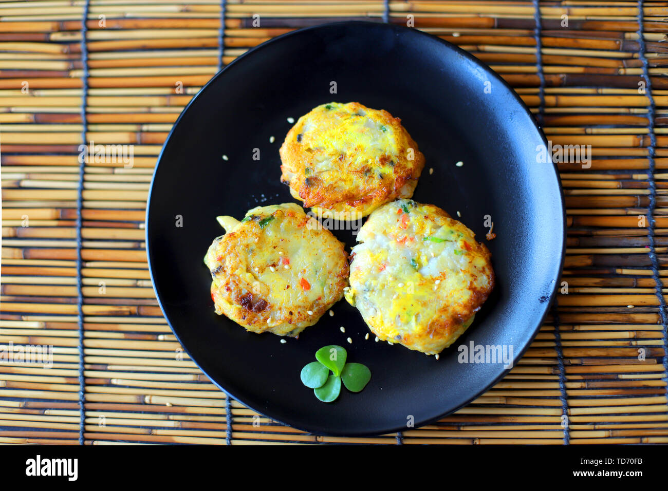 Seafood hash browns Stock Photo - Alamy