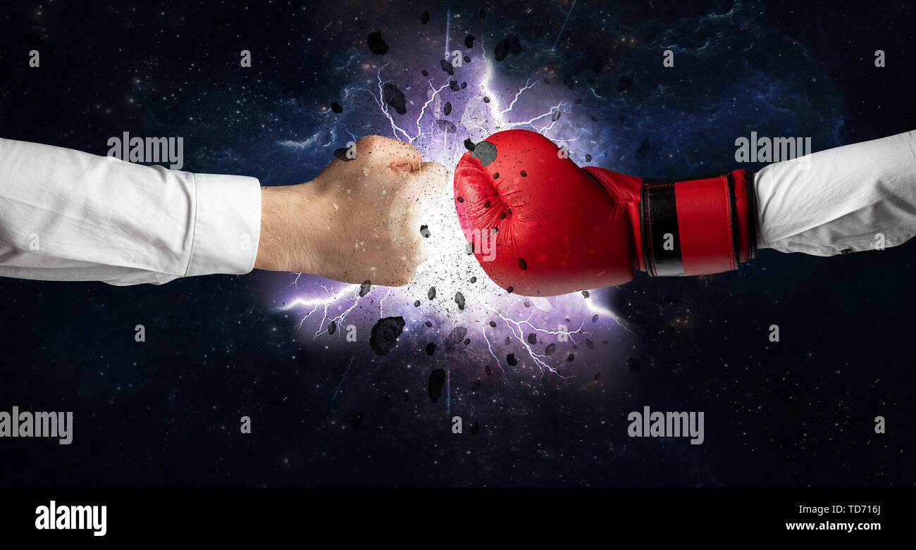 Two hands fighting with storm explosion concept Stock Photo - Alamy