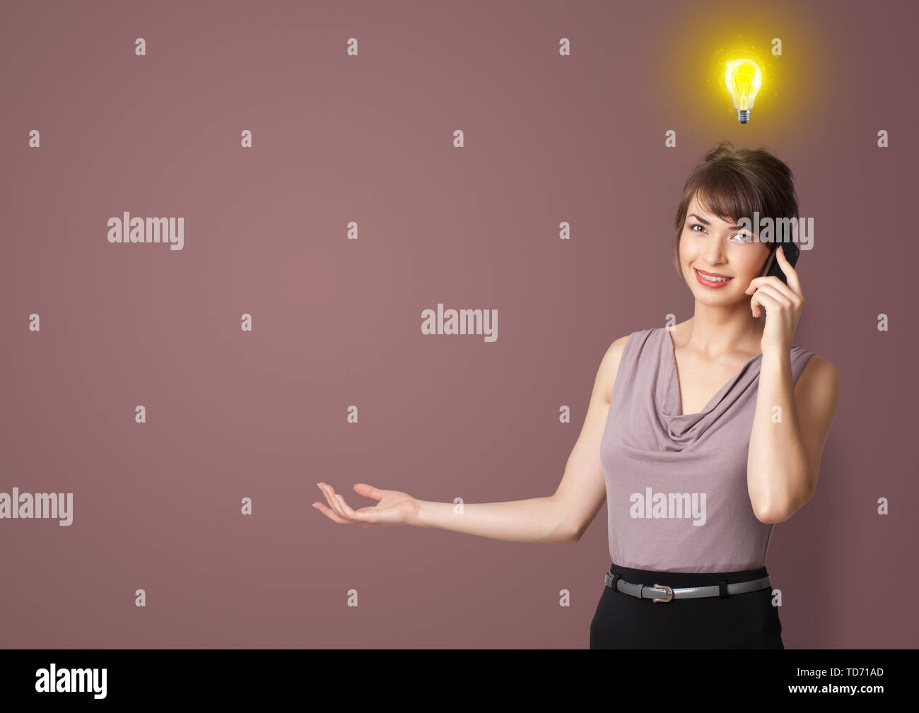 Young smiling person presenting new idea concept Stock Photo - Alamy