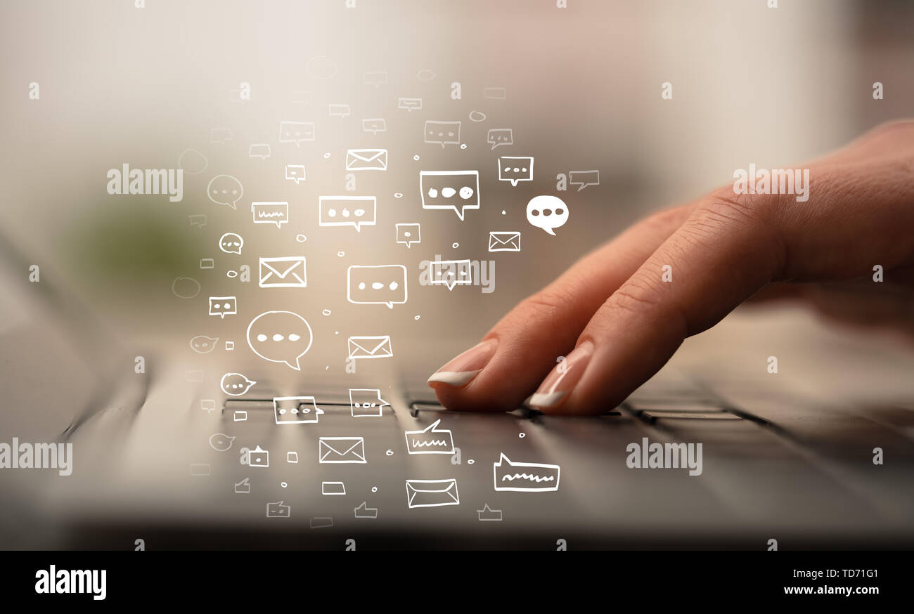 Business woman hand typing on keyboard with chat icons around Stock ...