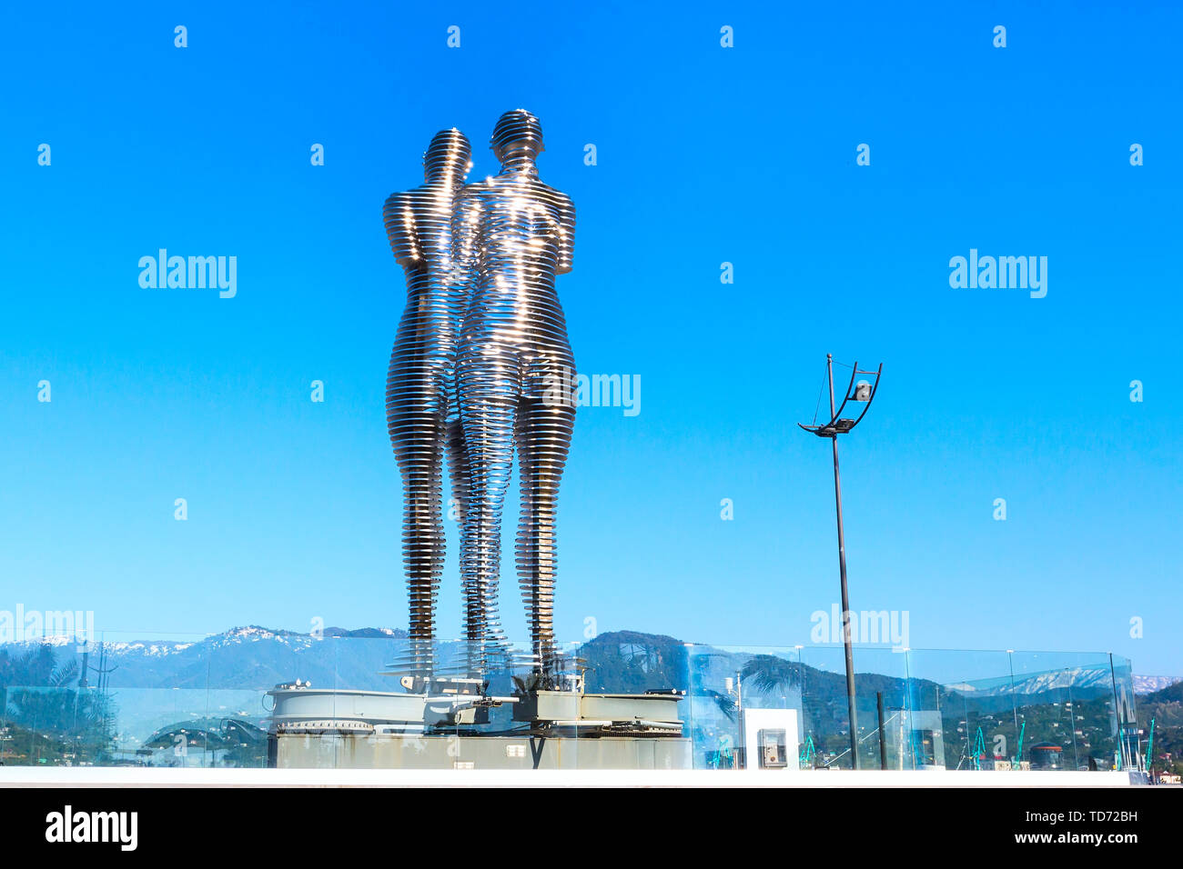 Batumi, Georgia - April 30, 2017: Moving metal sculpture Man and Woman ...