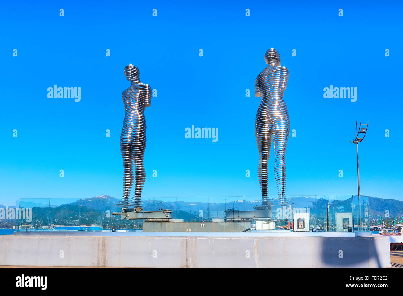 Batumi, Georgia - April 30, 2017: Moving metal sculpture Man and Woman ...