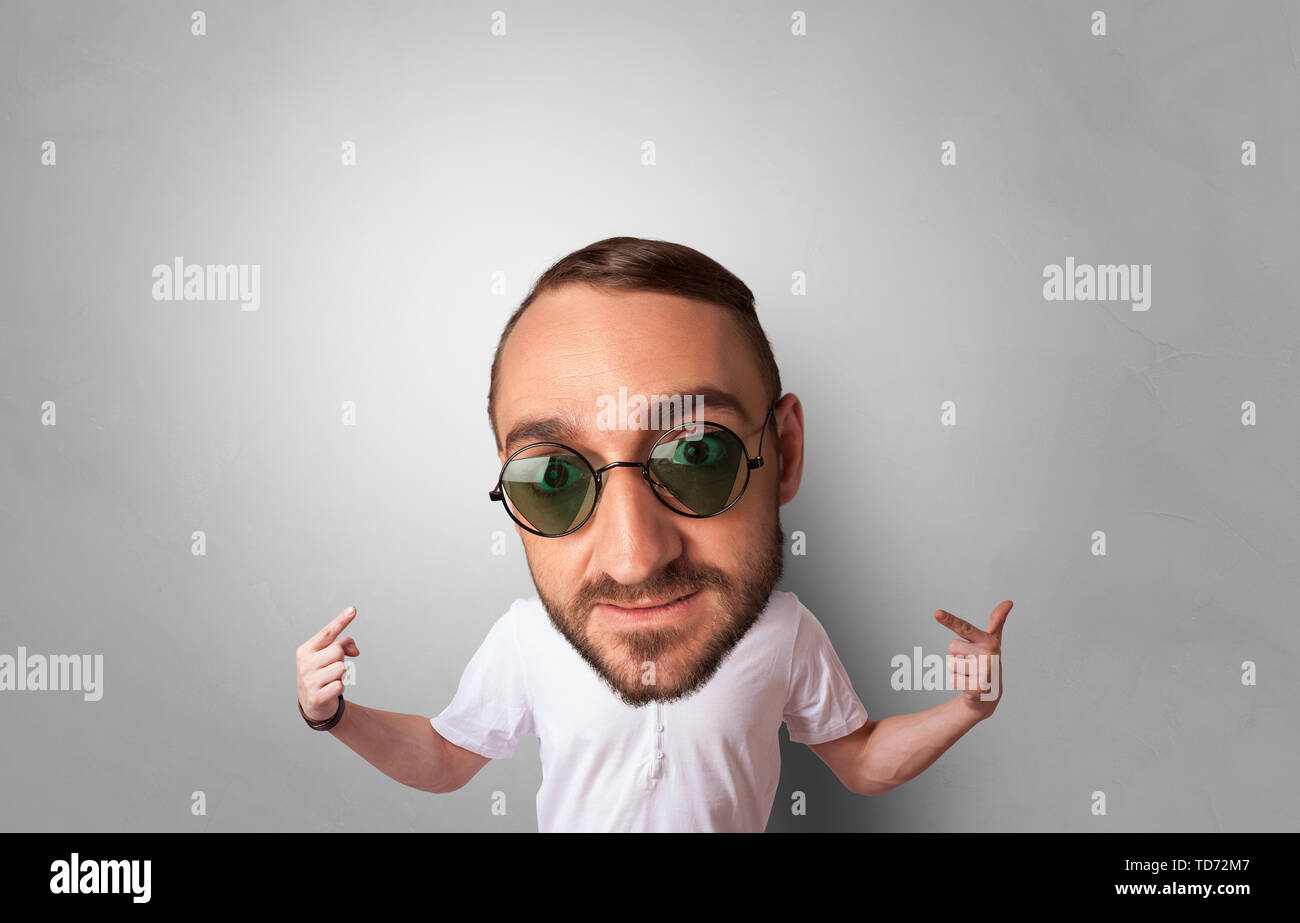 Big head on small body with copy space Stock Photo - Alamy
