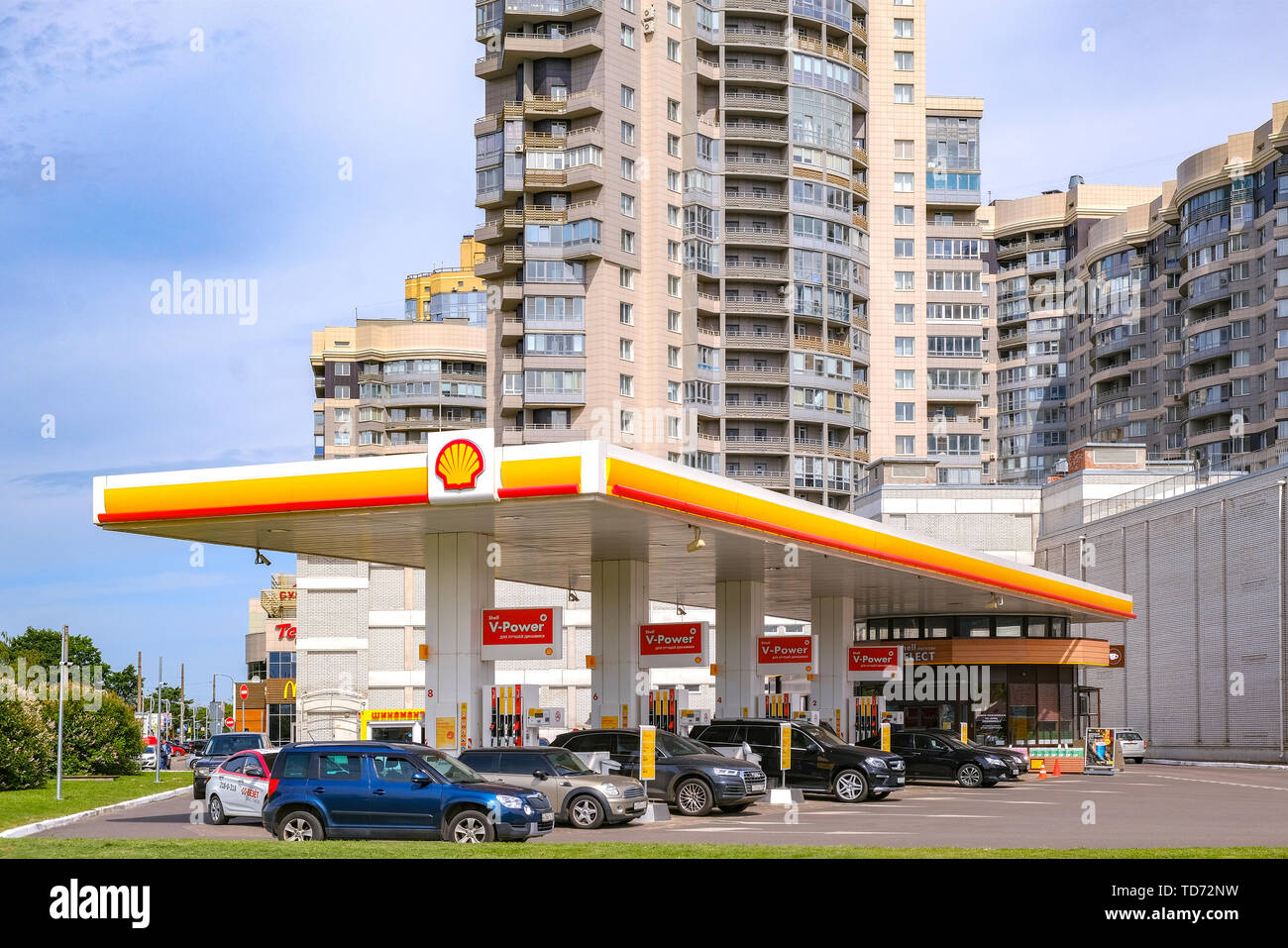 Shell gas station on the background of a Modern multi-storey building ...