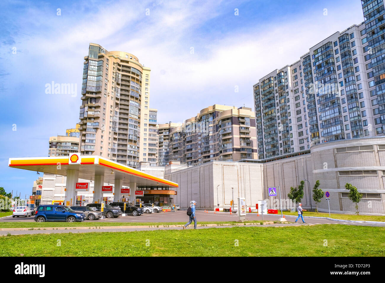 Shell gas station on the background of a Modern multi-storey building ...