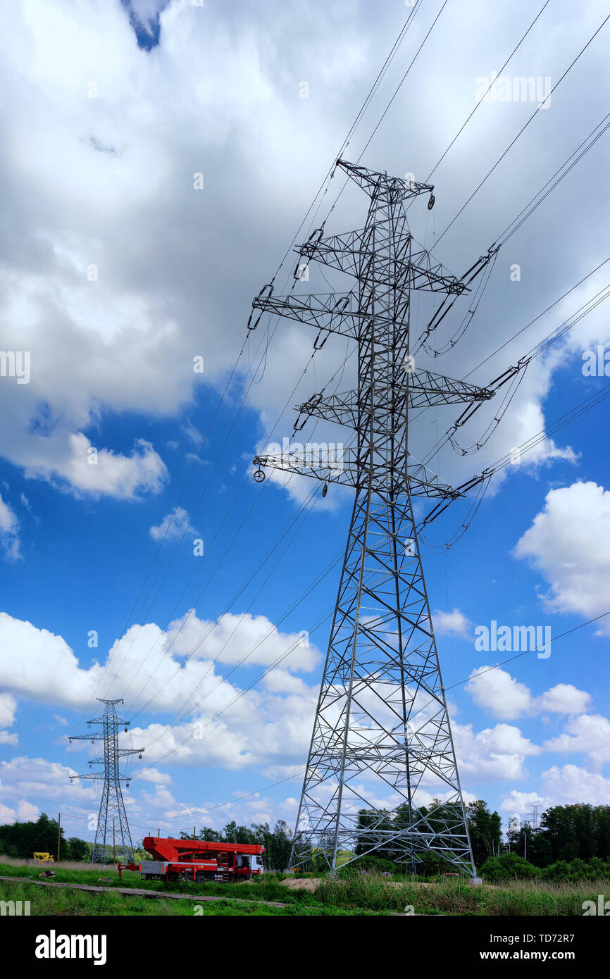 New power pole on the background of clouds Stock Photo - Alamy