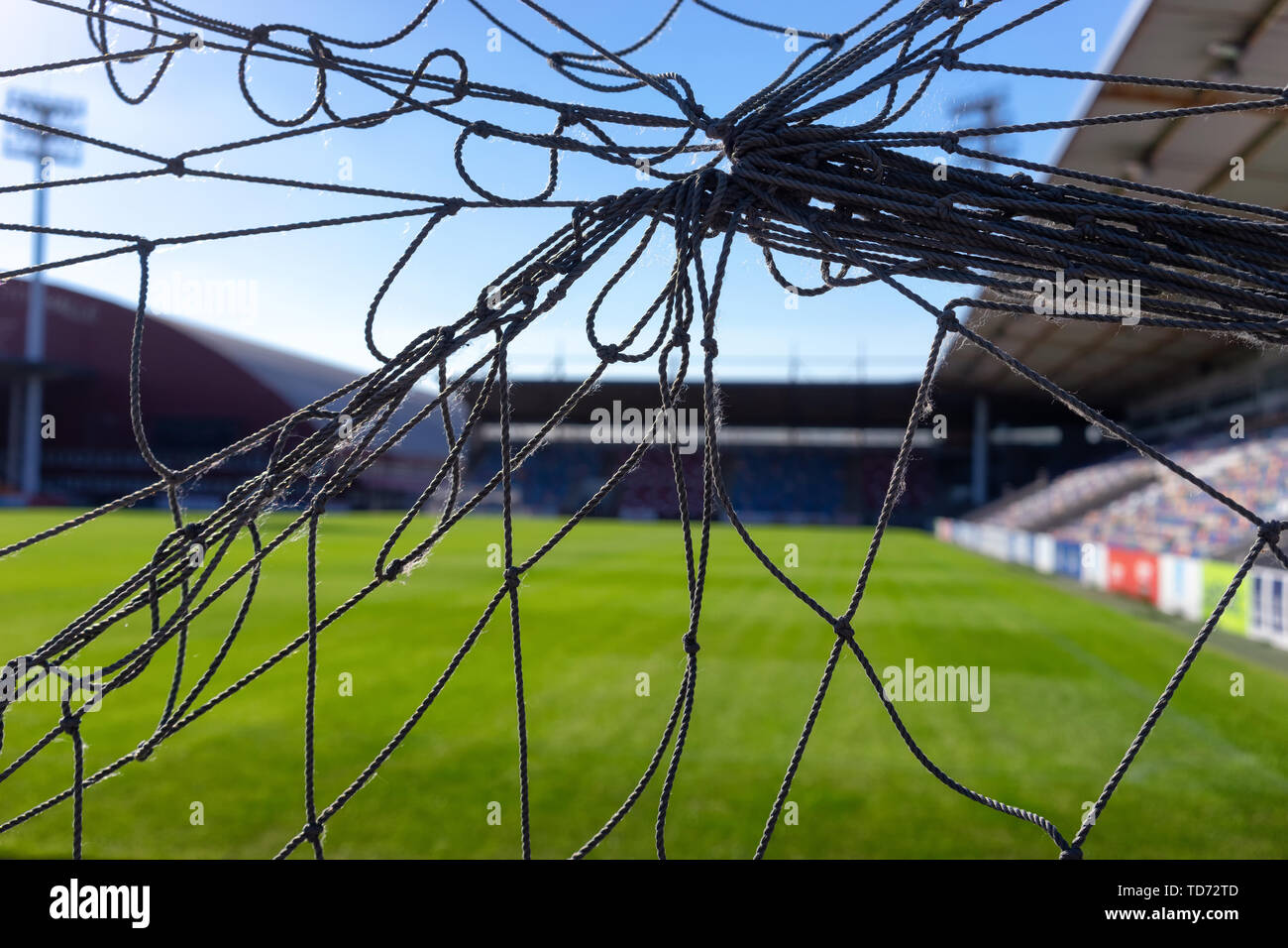 Football pitch and goal on the village green hi-res stock photography ...
