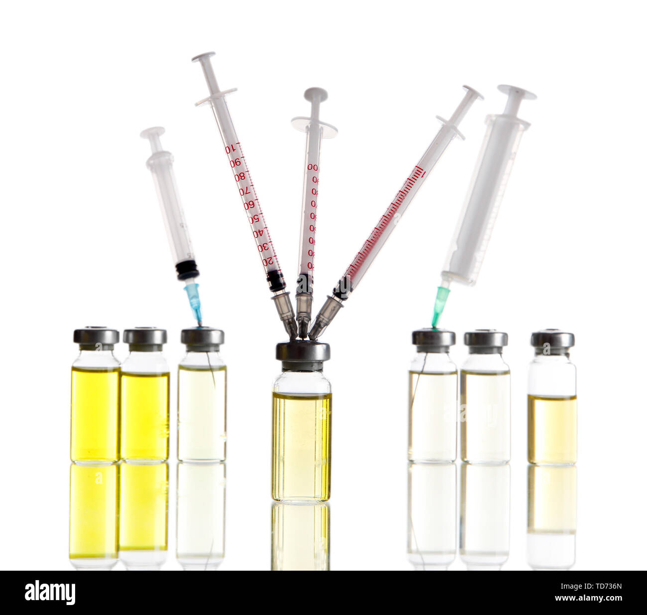 Medical bottles and syringes isolated on white Stock Photo - Alamy