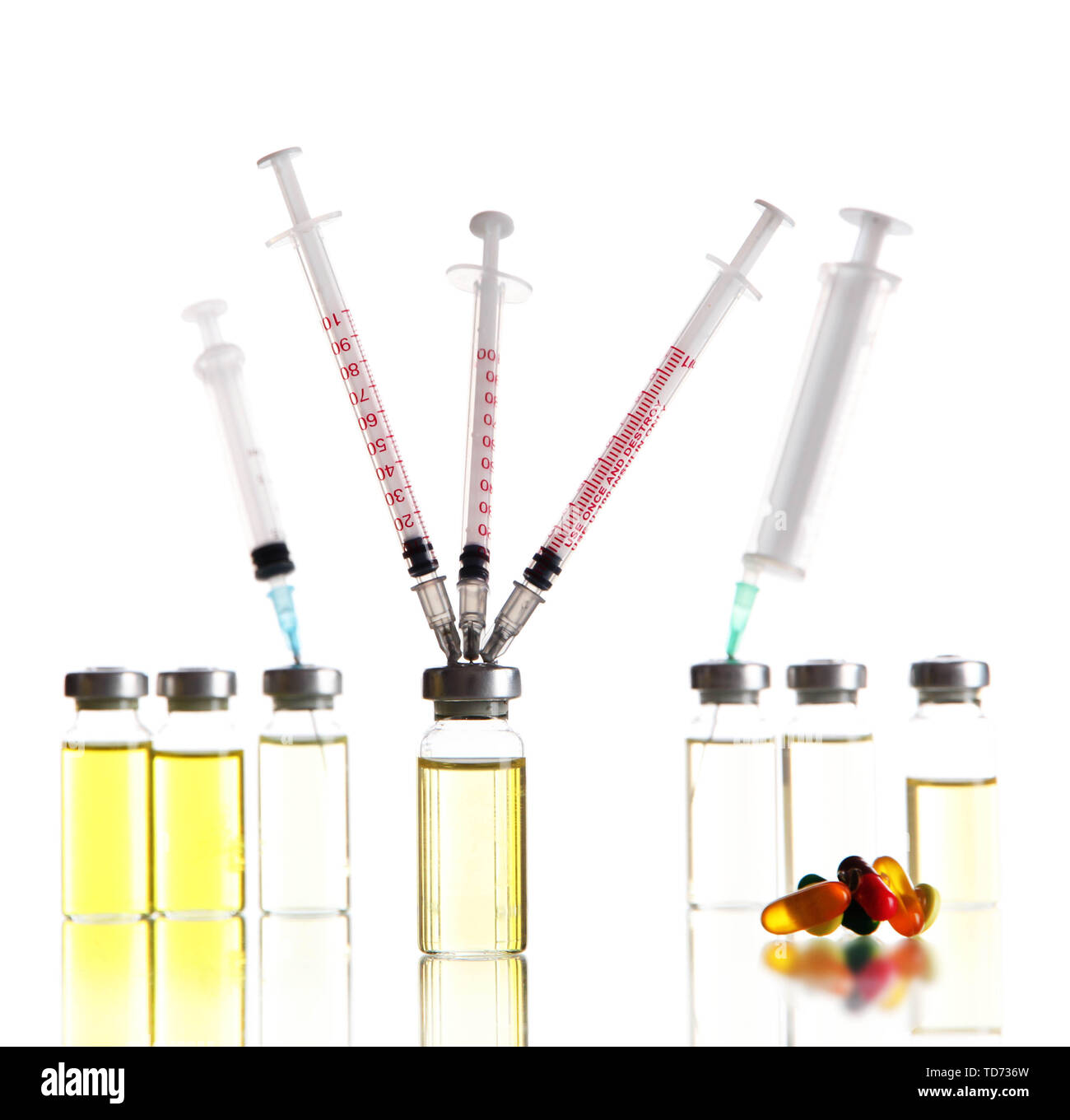 Medical bottles tablets and syringes isolated on white Stock Photo - Alamy