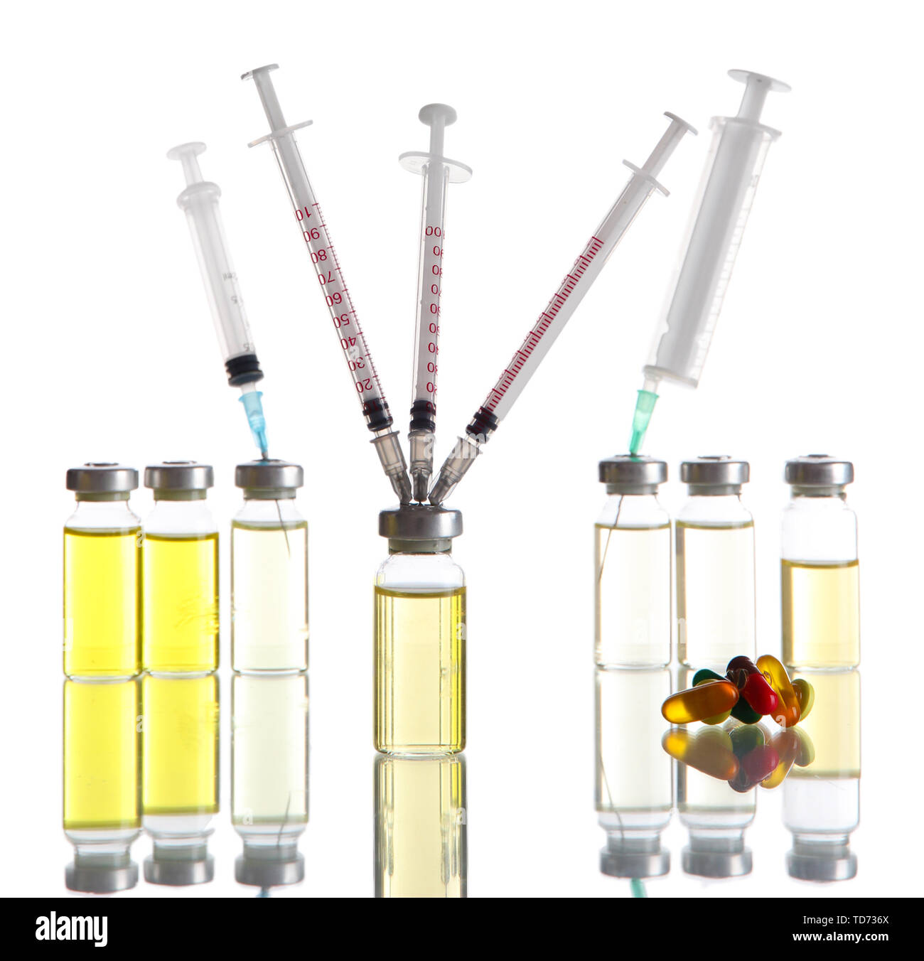Medical bottles tablets and syringes isolated on white Stock Photo - Alamy
