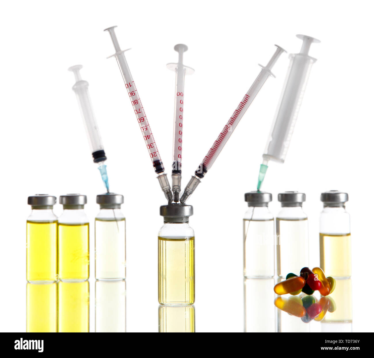Medical bottles tablets and syringes isolated on white Stock Photo - Alamy