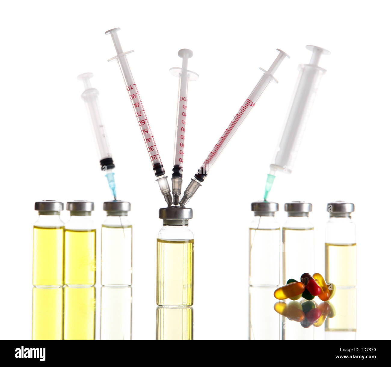 Medical bottles tablets and syringes isolated on white Stock Photo - Alamy