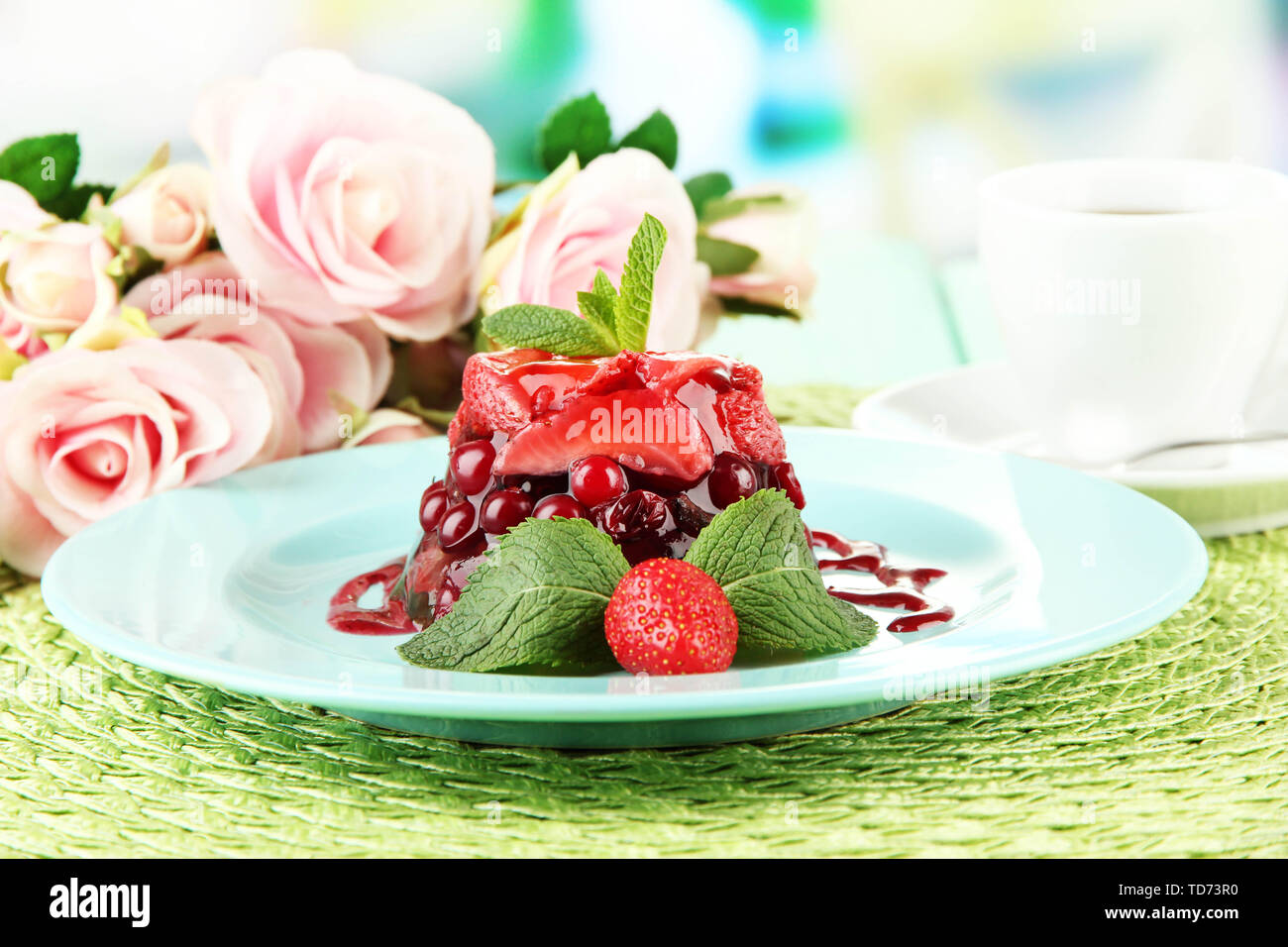 Tasty jelly dessert with fresh berries, on bright background Stock ...