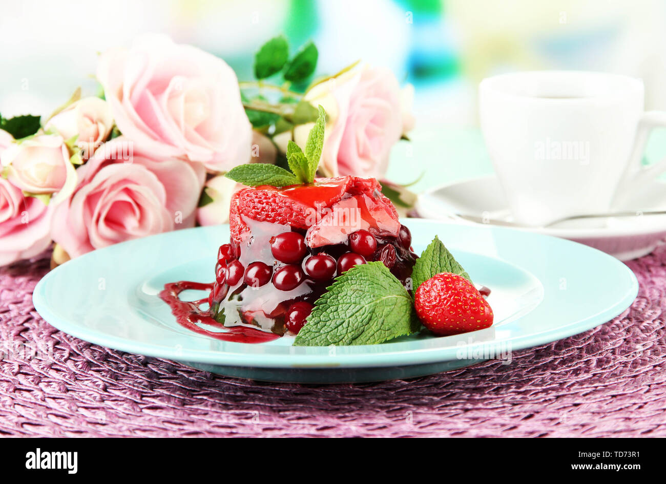 Tasty jelly dessert with fresh berries, on bright background Stock ...