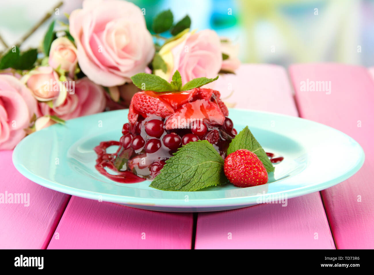 Tasty jelly dessert with fresh berries, on bright background Stock ...