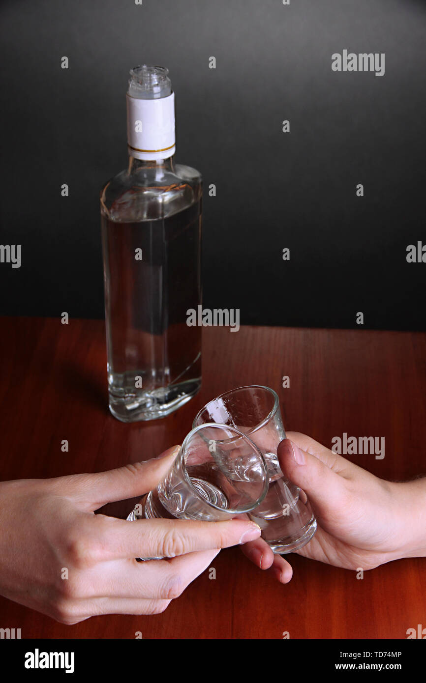 Drunk mans drinks vodka close-up Stock Photo - Alamy