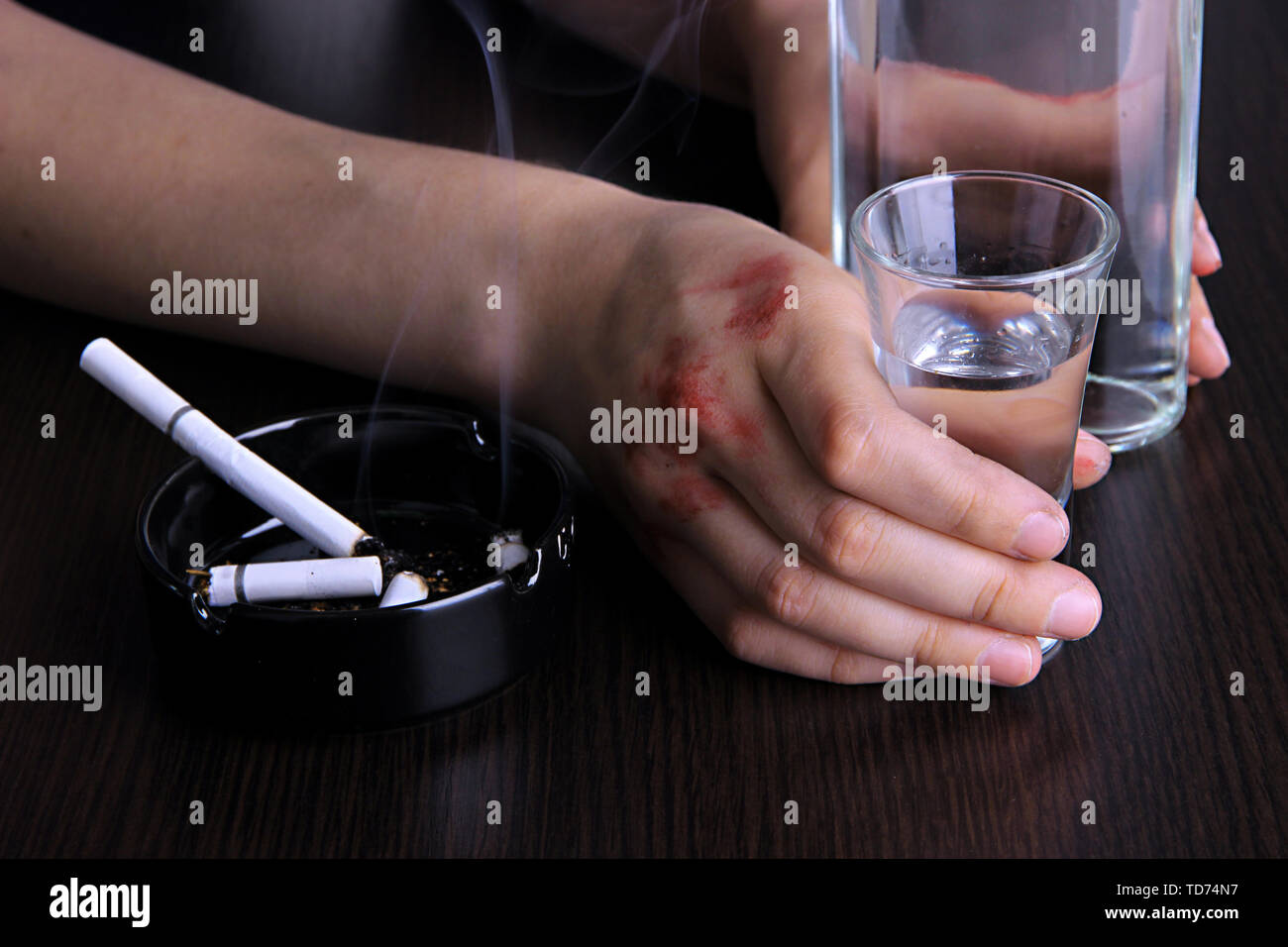 Crying woman with cigarette hi-res stock photography and images - Alamy