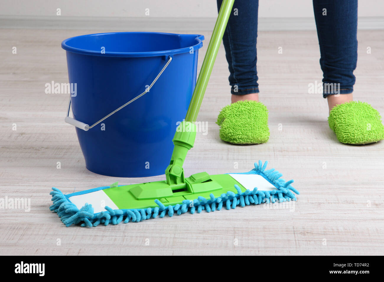 Cleaning floor in room close-up Stock Photo - Alamy