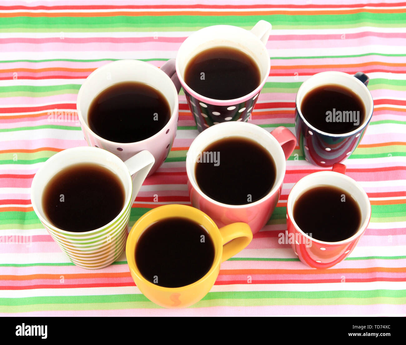 Many cups of coffee on striped napkin Stock Photo - Alamy