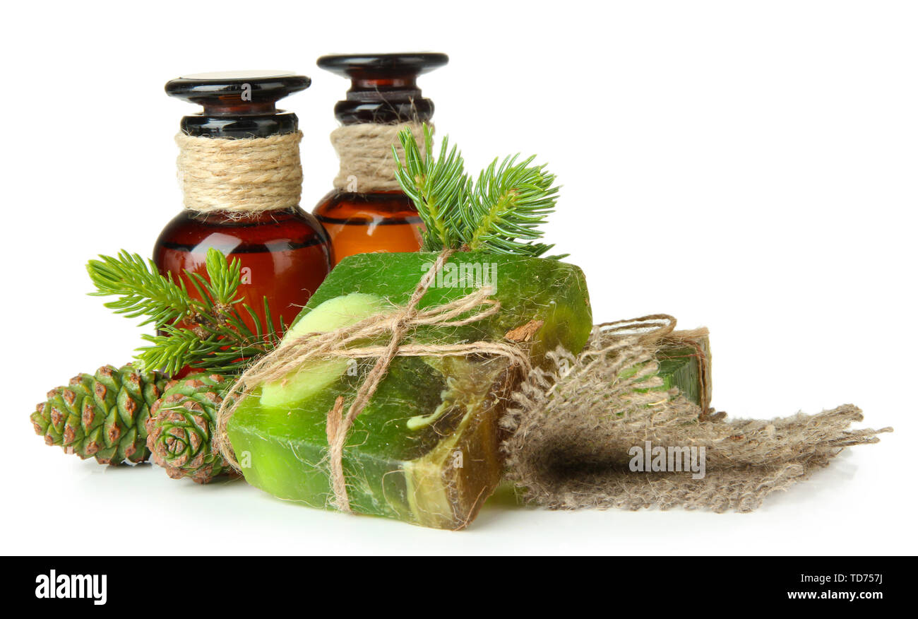 Hand-made soap and bottles of fir tree oil, isolated on white Stock ...