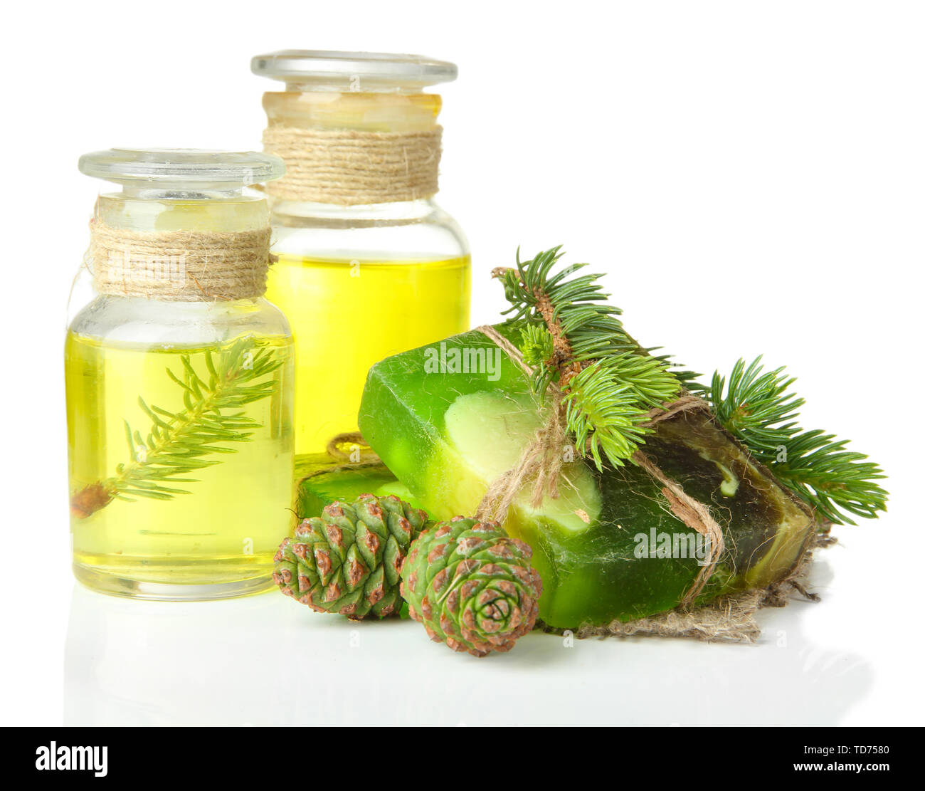 Hand-made soap and bottles of fir tree oil, isolated on white Stock ...