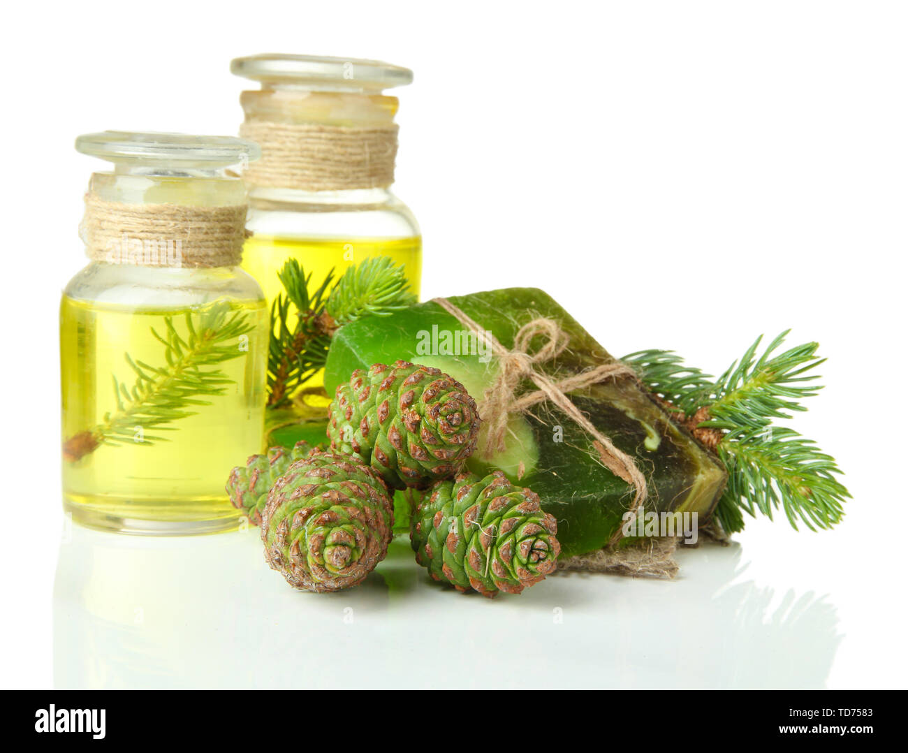 Hand-made soap and bottles of fir tree oil, isolated on white Stock ...