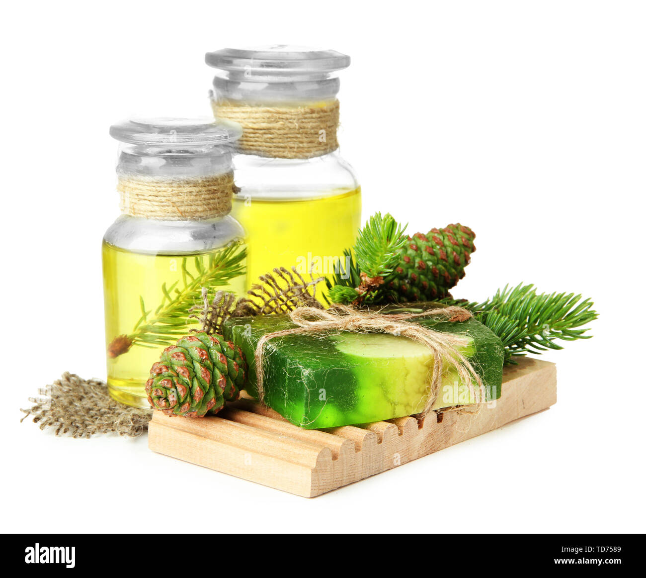 Hand-made soap and bottles of fir tree oil, isolated on white Stock ...