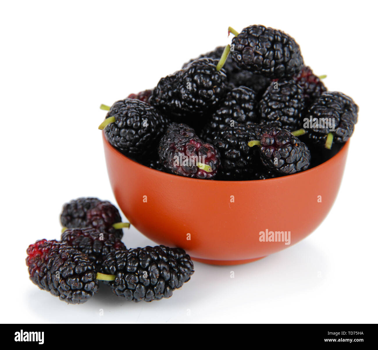 Ripe mulberries in bowl isolated on white Stock Photo - Alamy