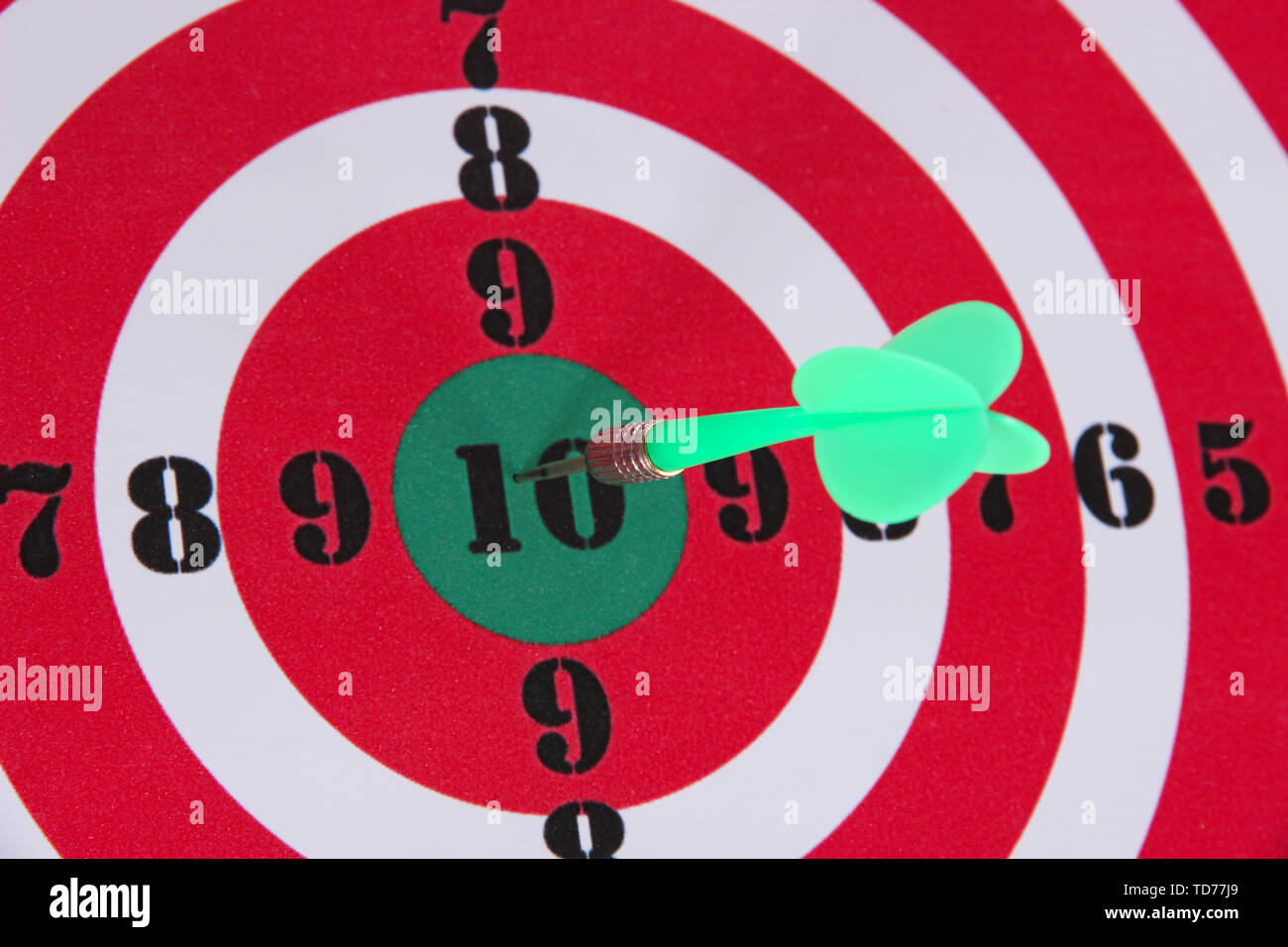 Target with dart close-up Stock Photo - Alamy