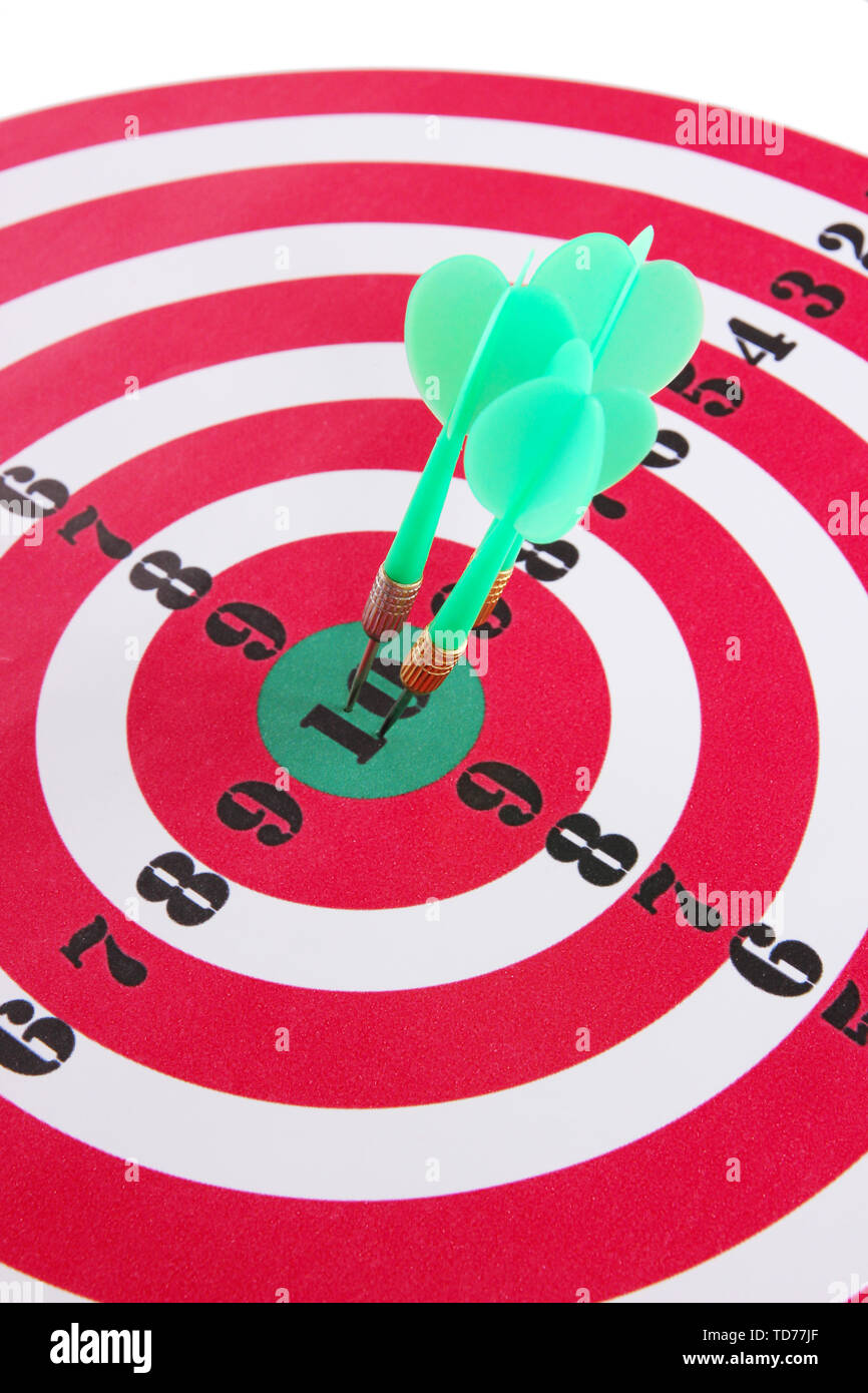 Target with darts close-up Stock Photo - Alamy