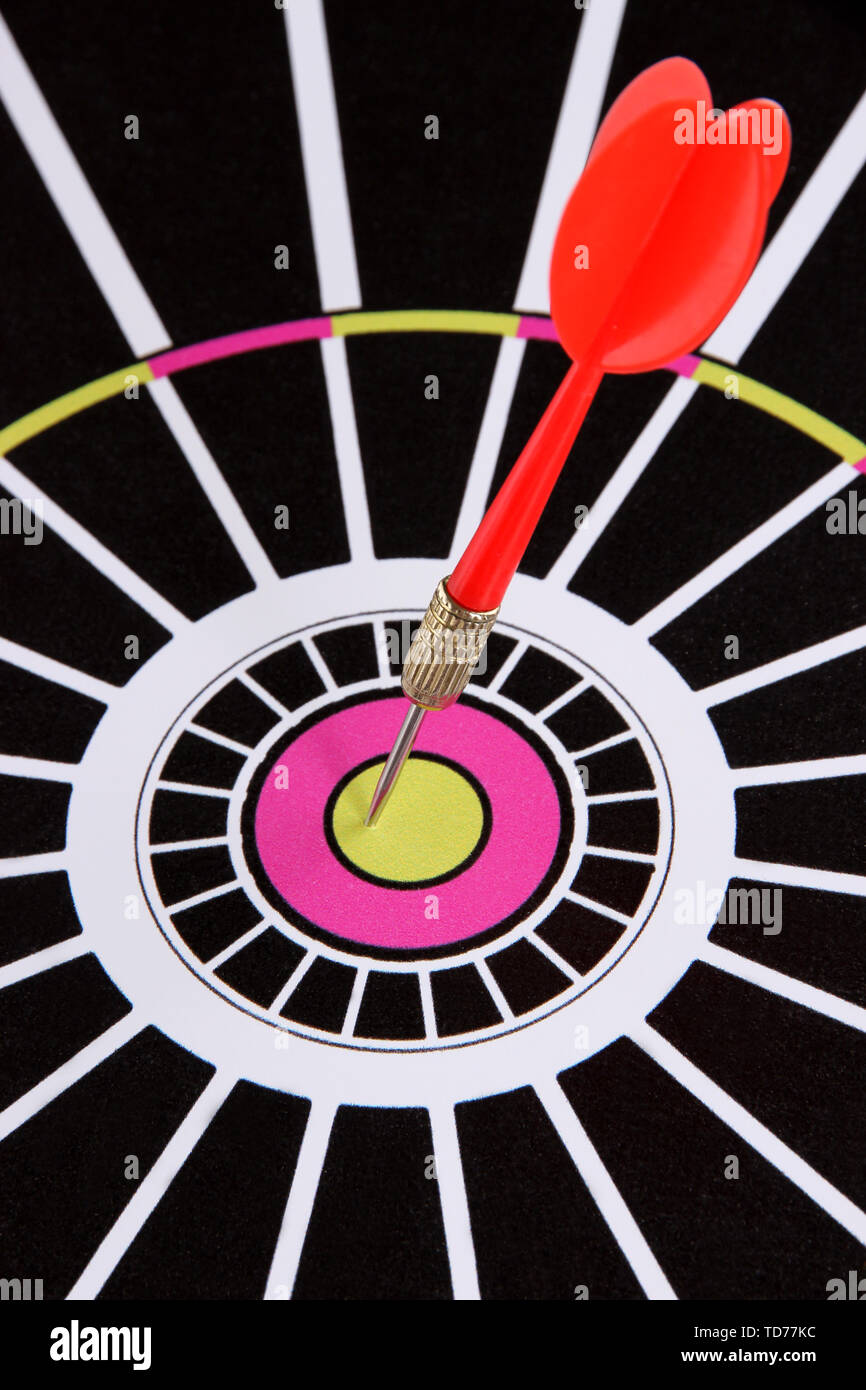 Target with dart close-up Stock Photo - Alamy