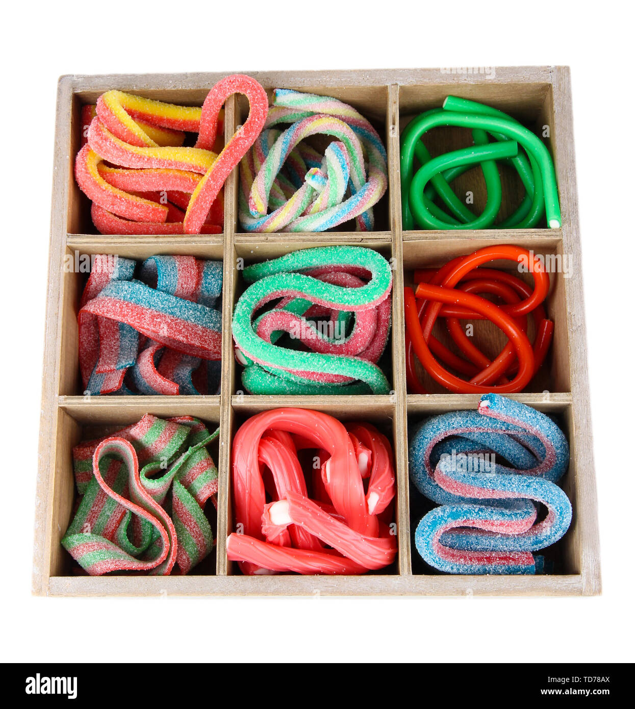 Sweet jelly candies in wooden box isolated on white Stock Photo - Alamy