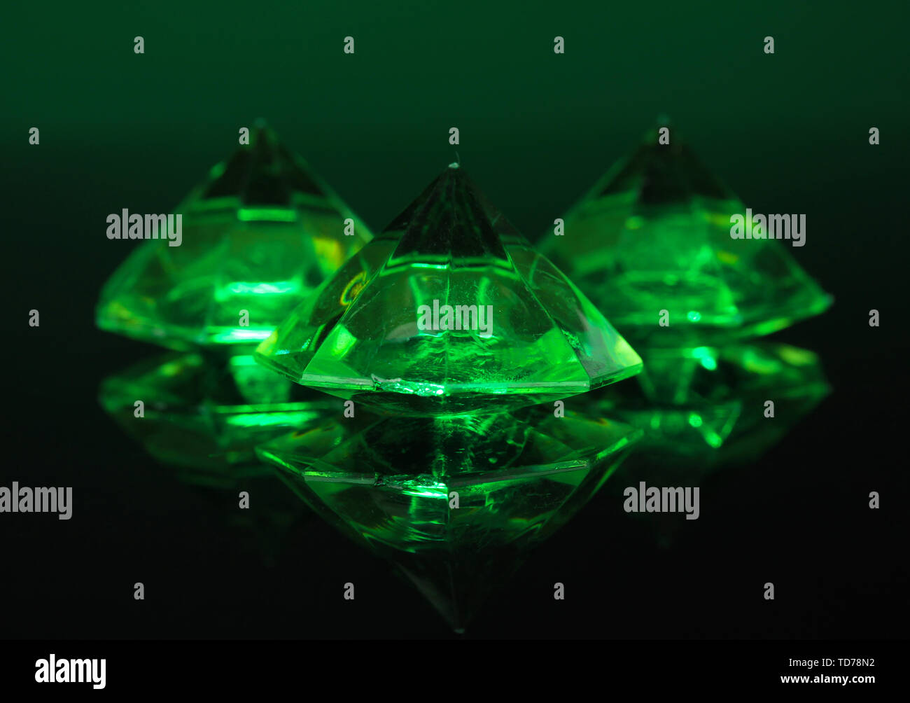 Diamonds on dark color background Stock Photo - Alamy