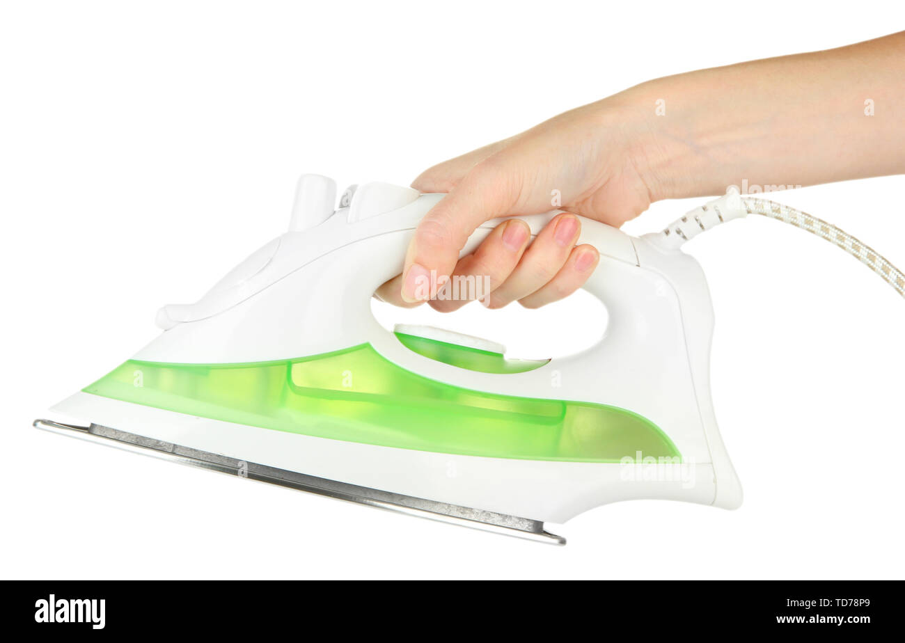 Steam iron in hand, isolated on white Stock Photo - Alamy