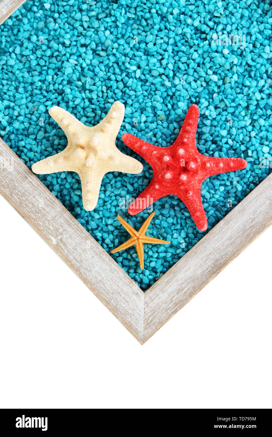 Decorative colored sand with shells isolated on white Stock Photo - Alamy