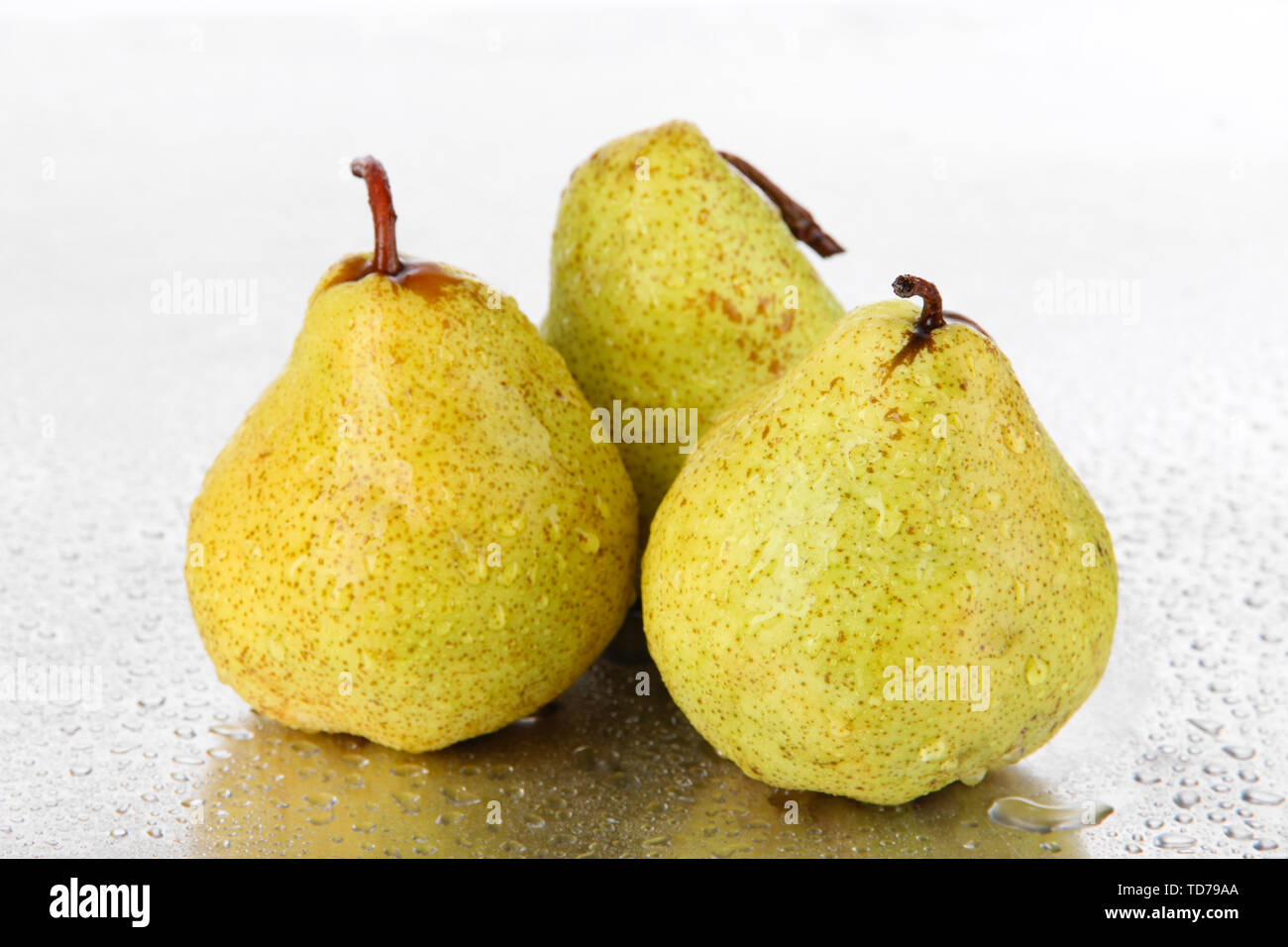 Pears on metal background Stock Photo - Alamy