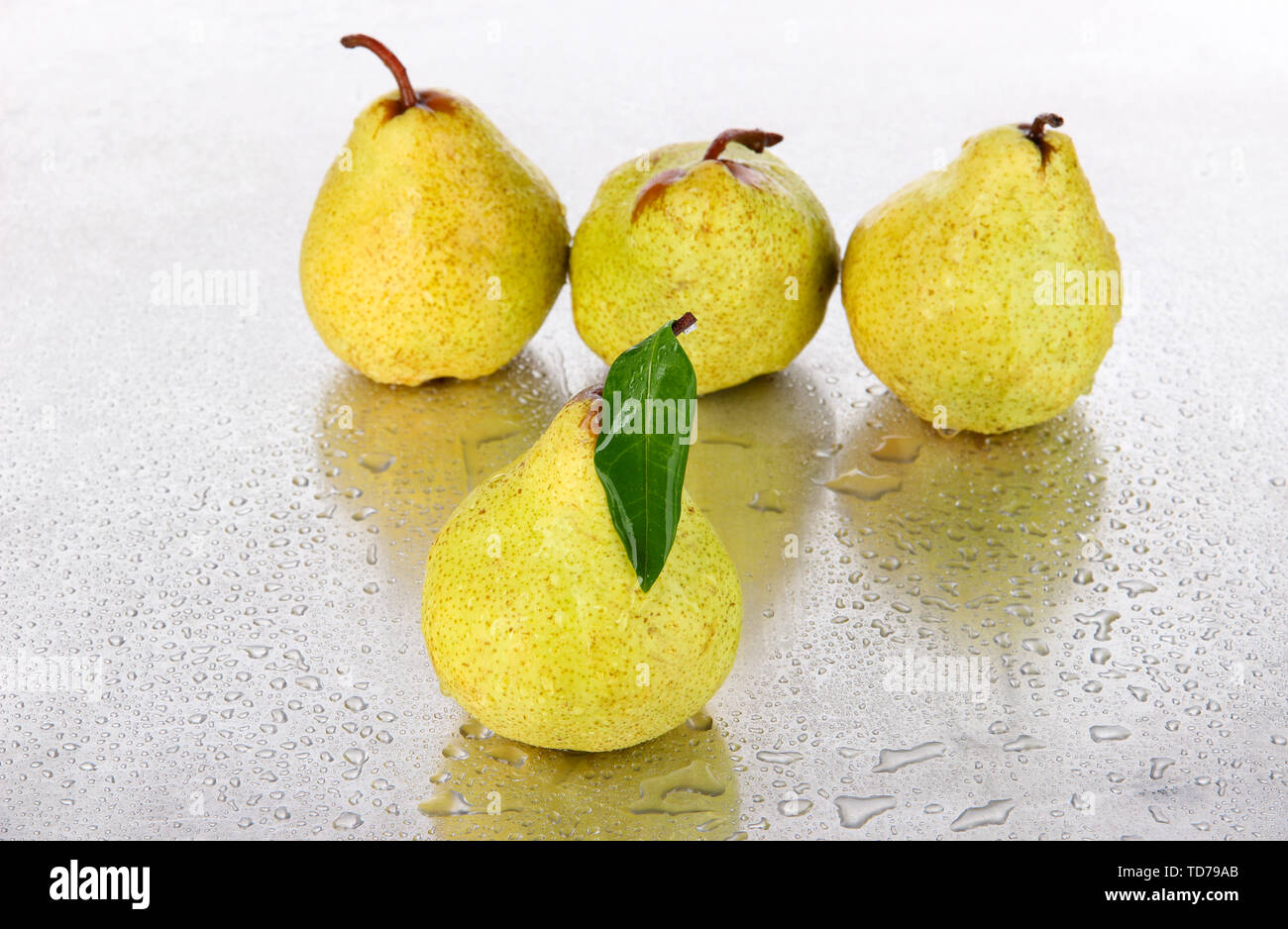 Pears on metal background Stock Photo - Alamy