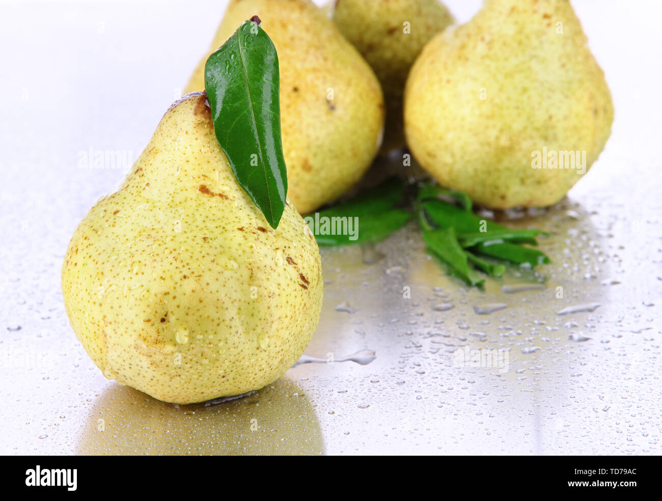 Pears on metal background Stock Photo - Alamy