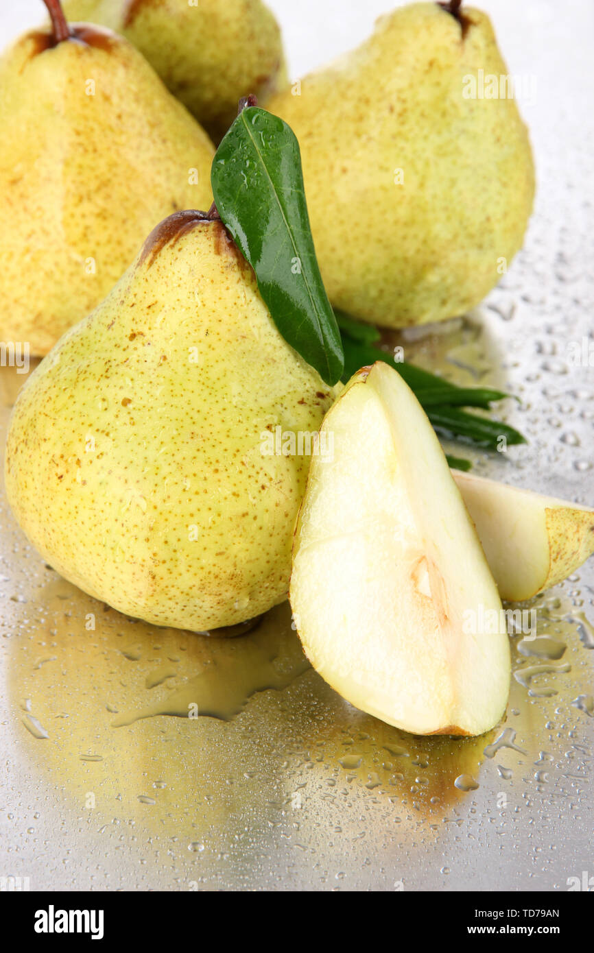 Pears on metal background Stock Photo - Alamy