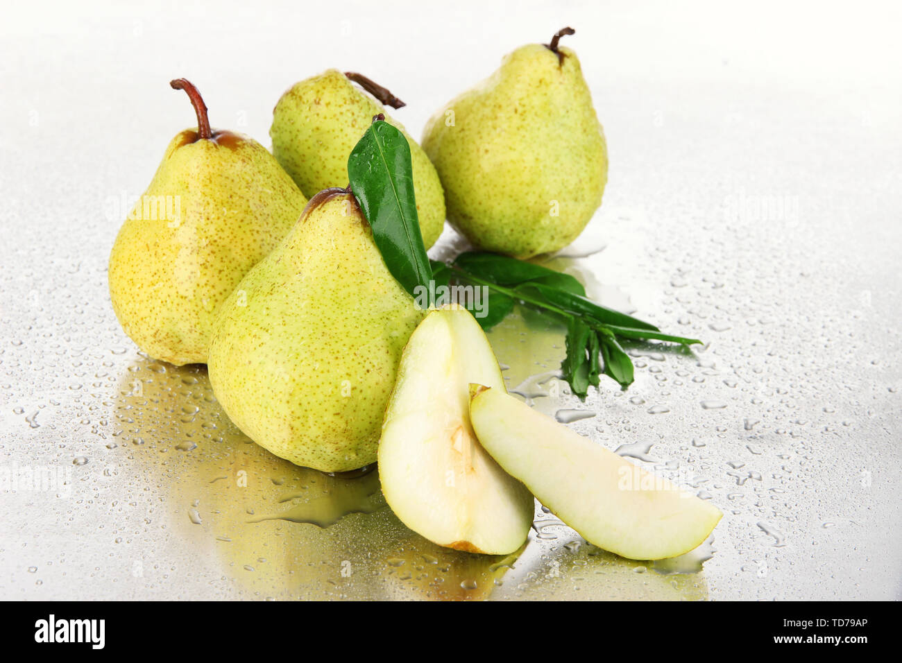 Pears on metal background Stock Photo - Alamy