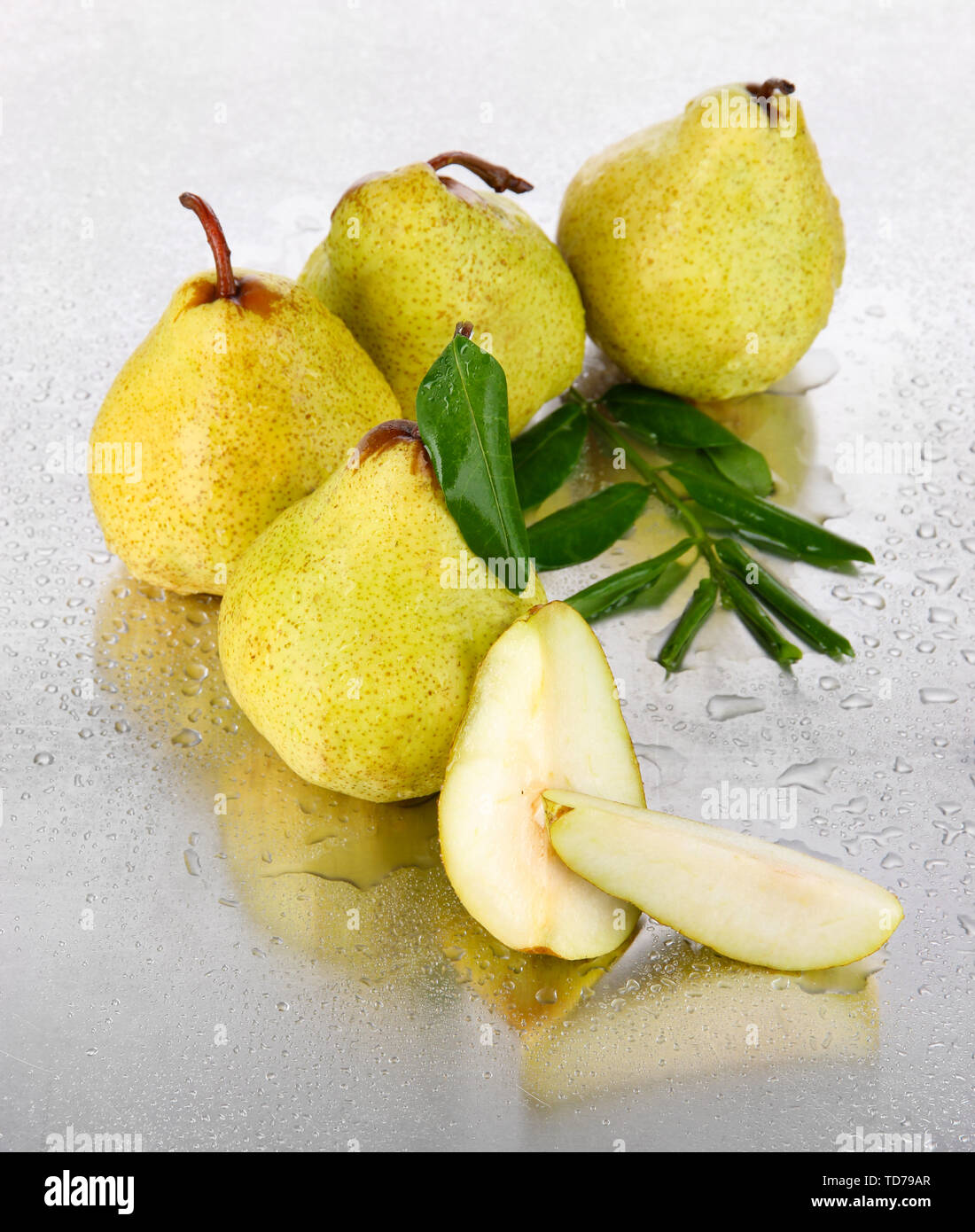 Pears on metal background Stock Photo - Alamy