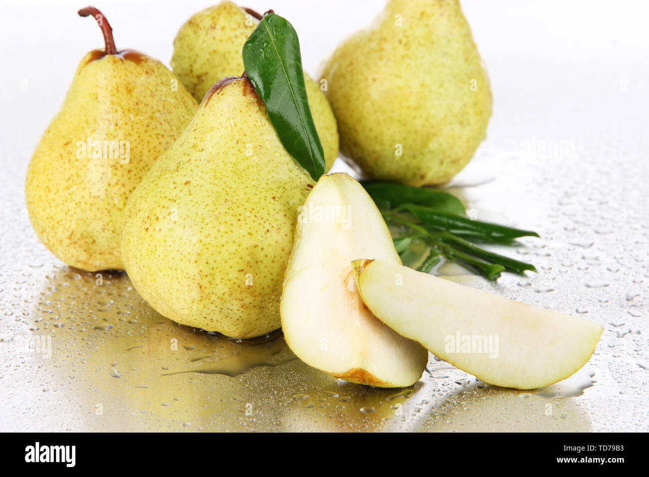 Pears on metal background Stock Photo - Alamy